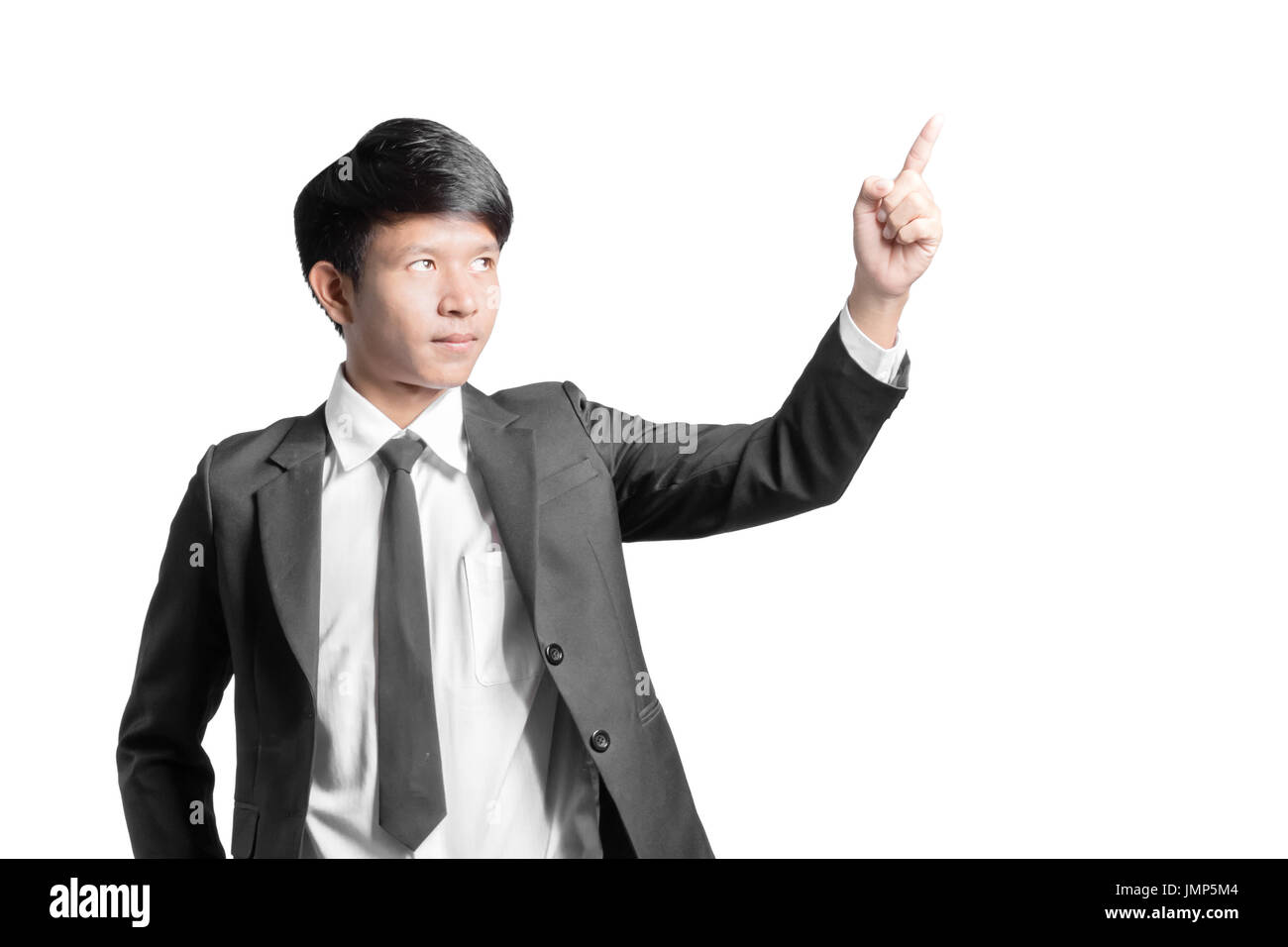 Portrait of a handsome businessman pointed the finger to top. Isolated ...