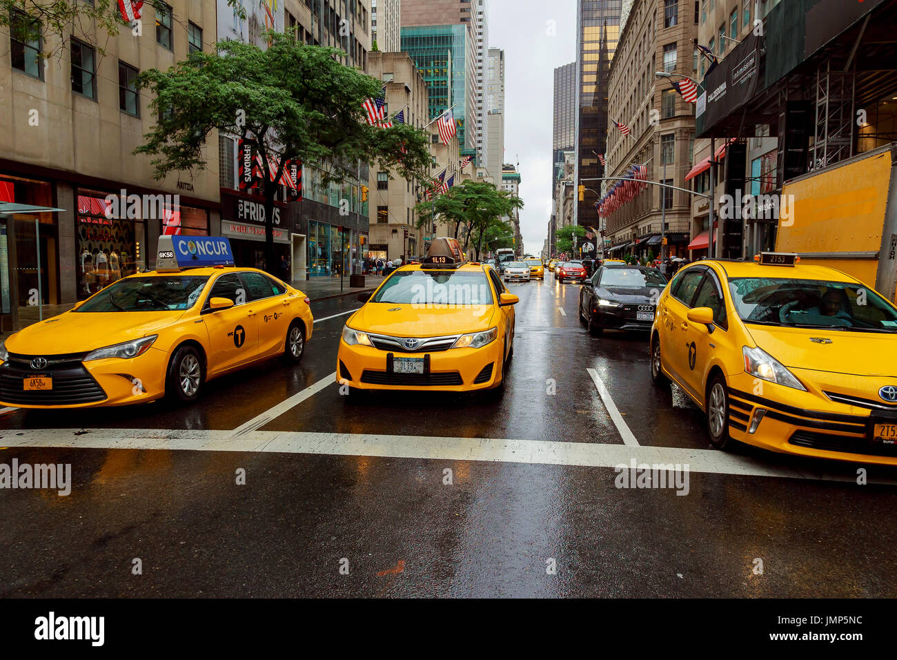 NEW YORK - JULY 2017: Taxi cars in Times Square, a busy tourist ...