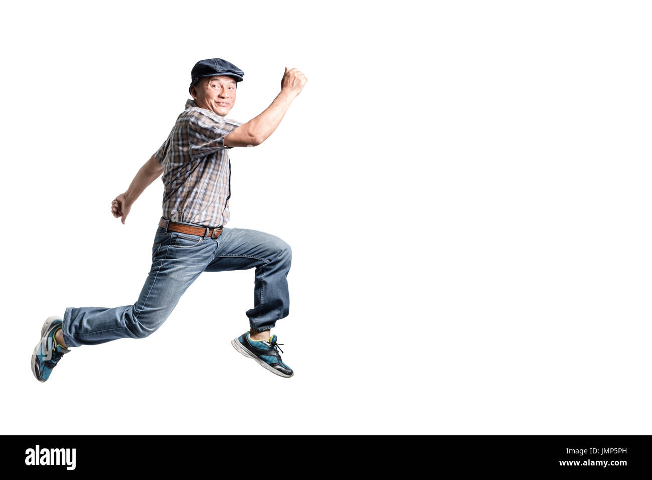 Portrait of a happy mature man jumping forward. Isolated full body on ...