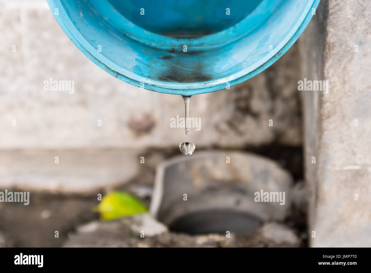 Stop motion of water drop from pvc tube Stock Photo - Alamy