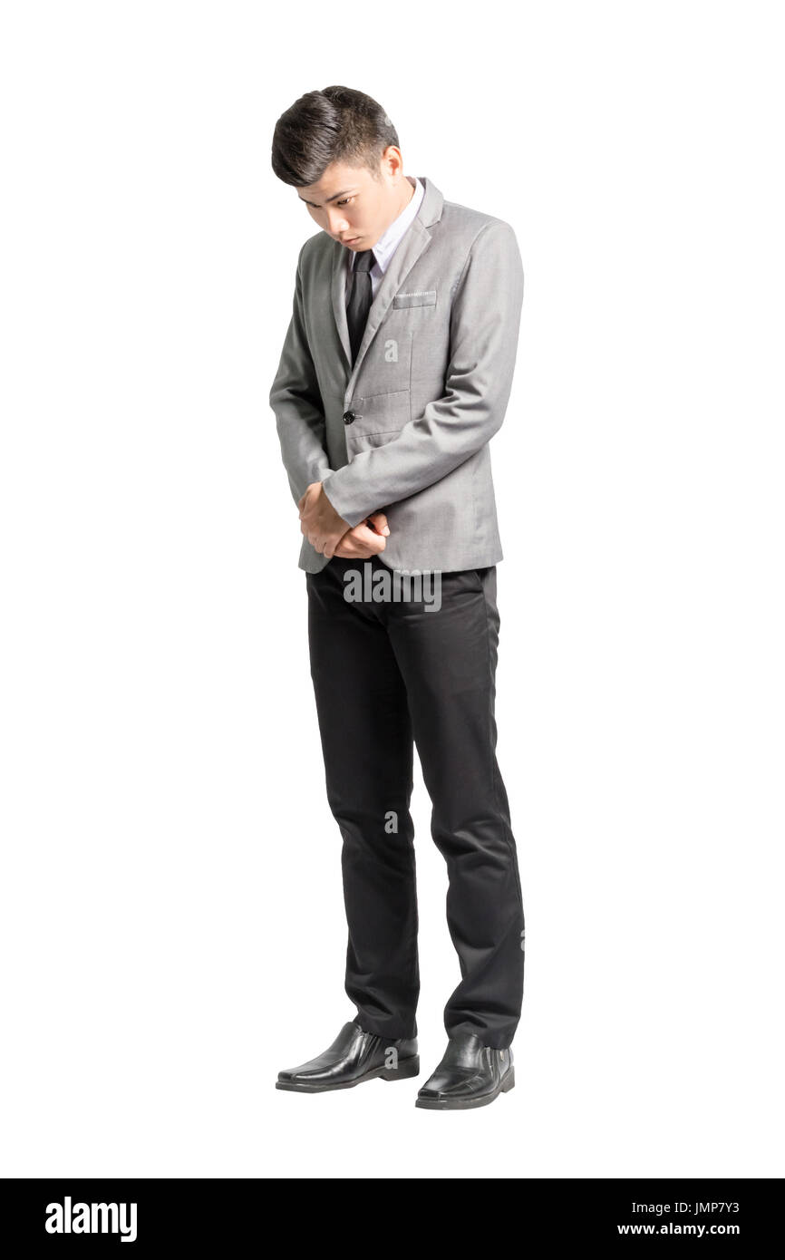 Portrait of a regret young business man. Isolated full body on white ...