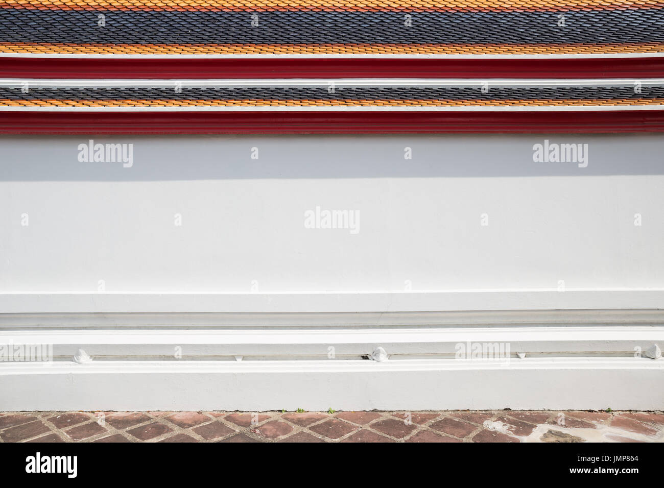 Flat plane of Thai's temple wall with colorful ceramic roof Stock Photo ...