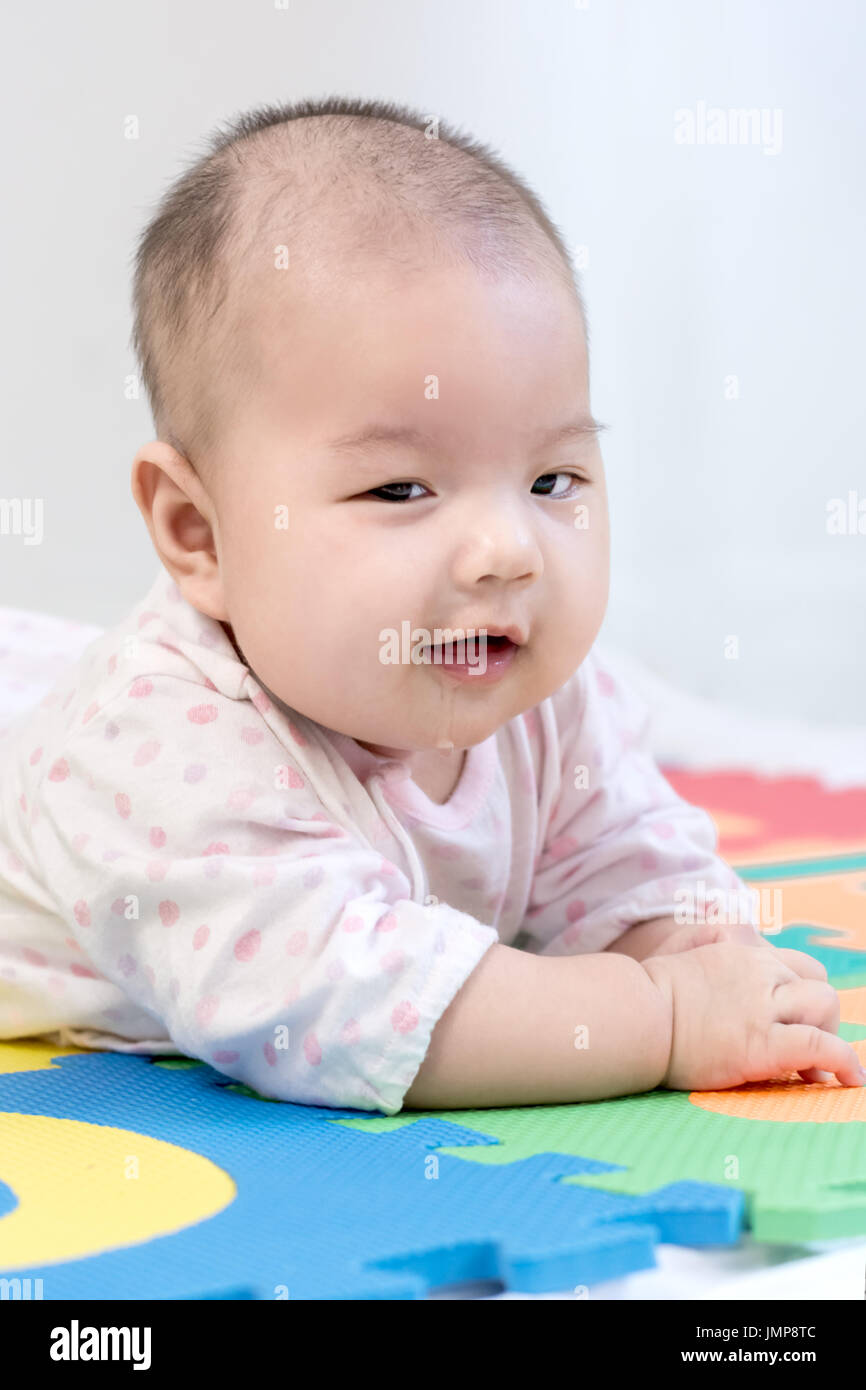 Adorable asian baby bed drooling hi-res stock photography and images ...
