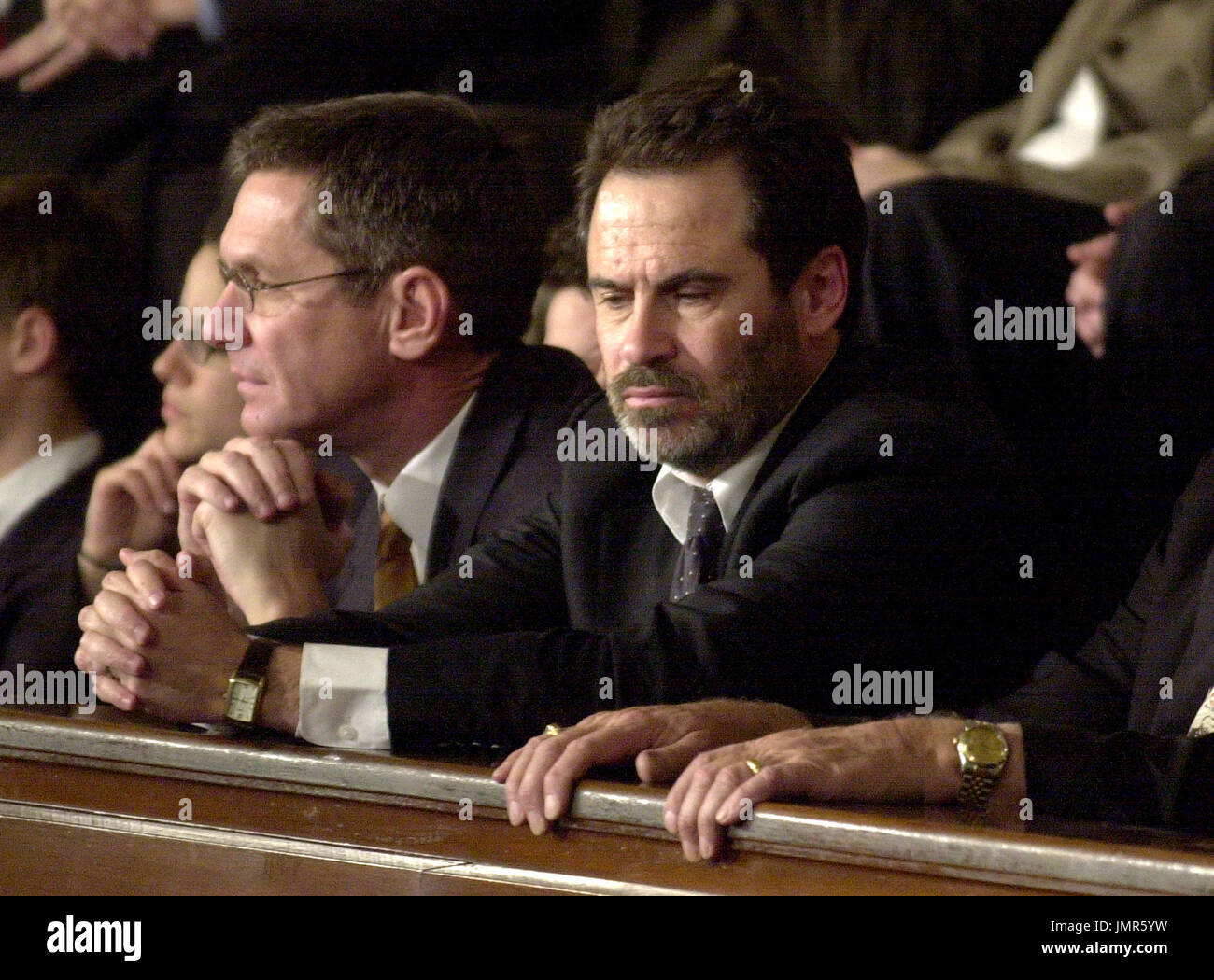 Comedian Dennis Miller listens intently to United States President ...