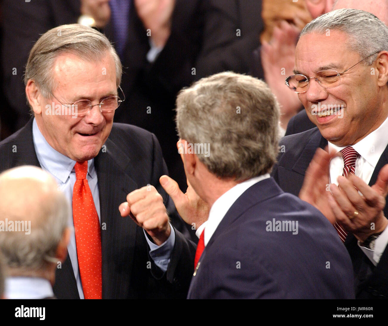 United States President George W. Bush gets some words of encouragement ...
