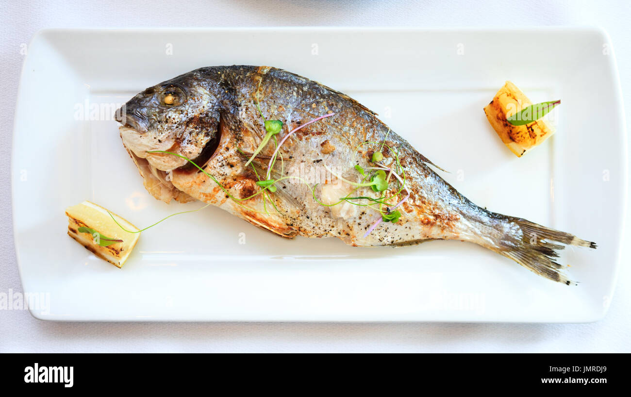 Grilled dorada fish Stock Photo - Alamy