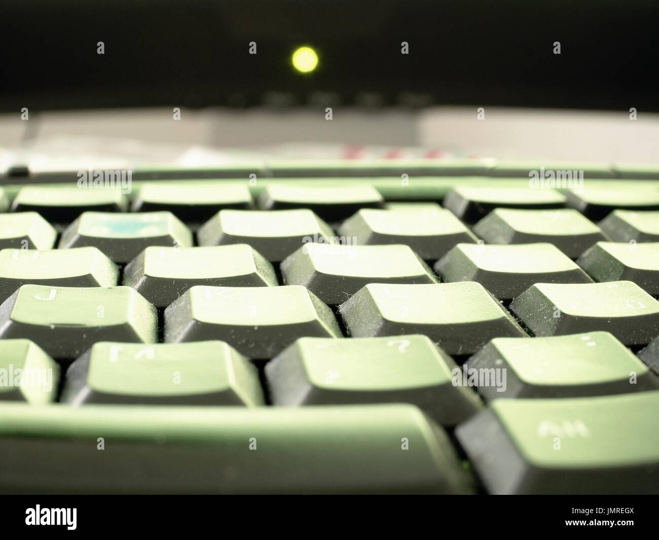 Close up detail view of heavy used and dirty laptop computer keyboard ...