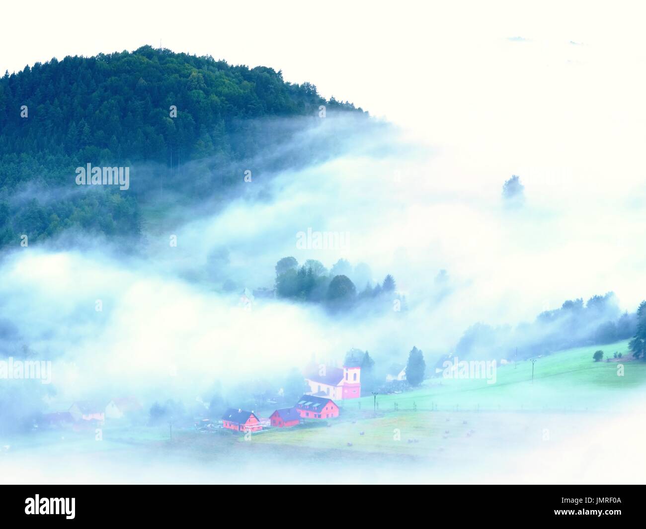 Heavy mist in landscape. Magnificent autumn creamy fog in countryside ...