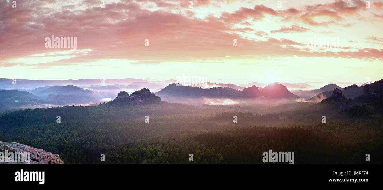 Red misty landscape panorama in mountains. Fantastic dreamy sunrise on ...