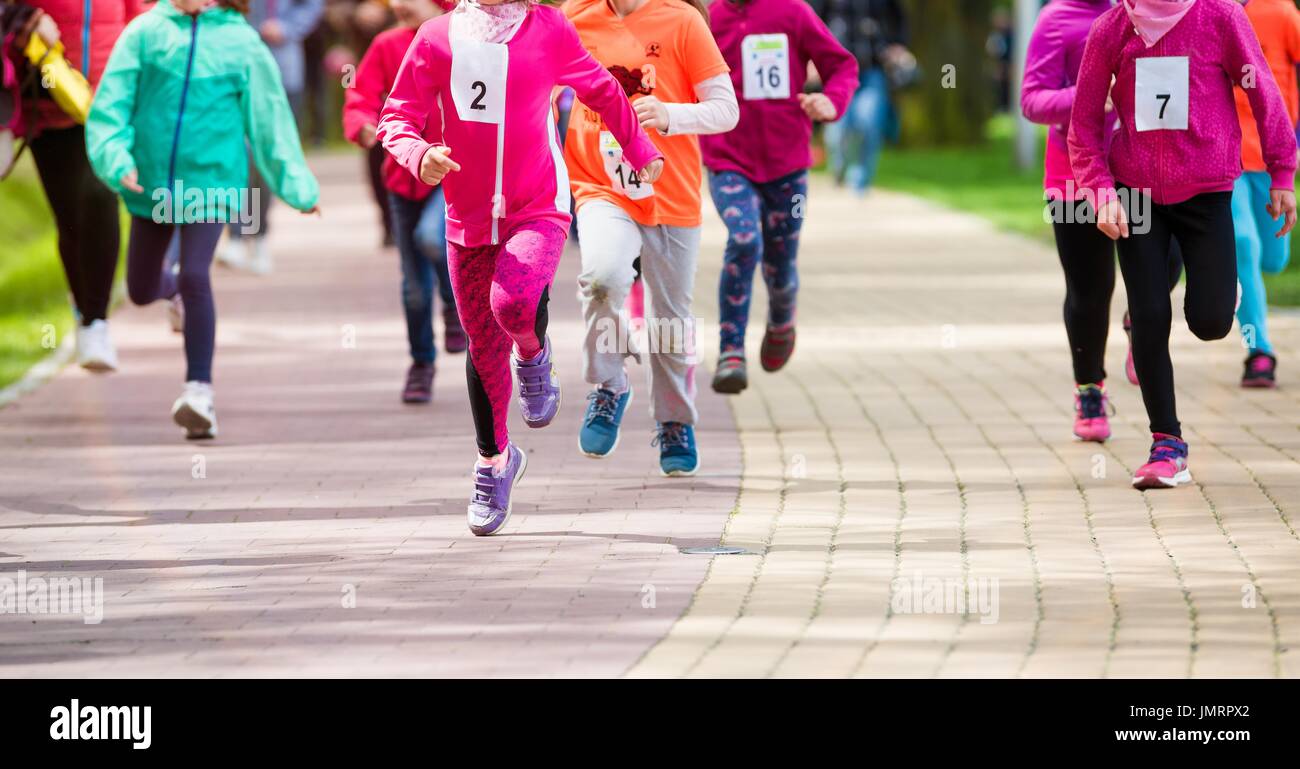 Children running in the park - summer race Stock Photo - Alamy