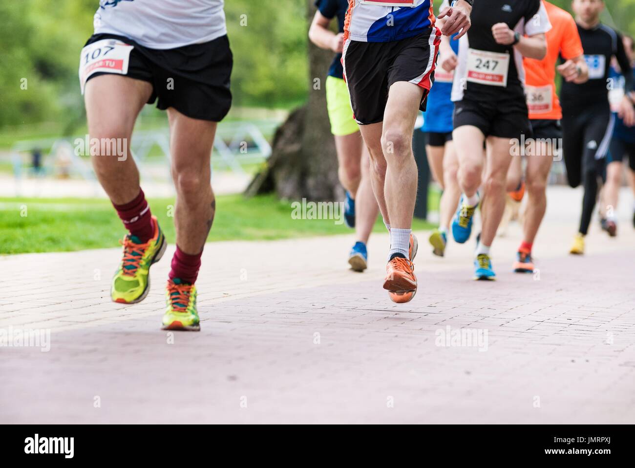 Summer running race in the park, people running Stock Photo - Alamy