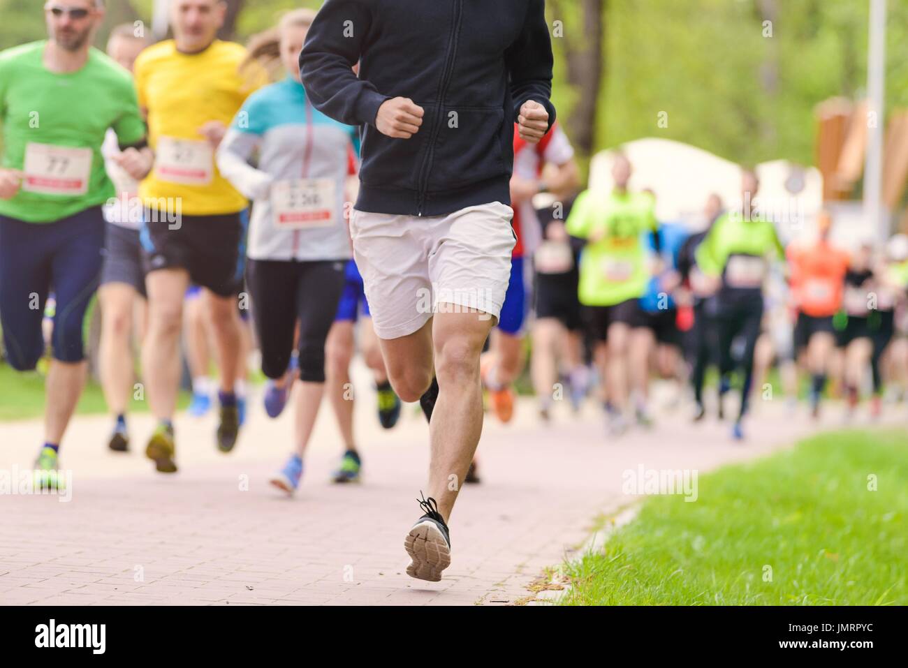 Summer running race in the park, people running Stock Photo - Alamy