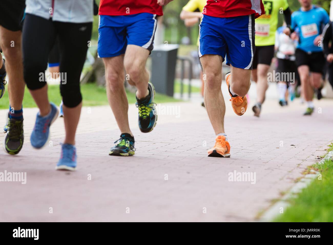 Summer running race in the park, people running Stock Photo - Alamy