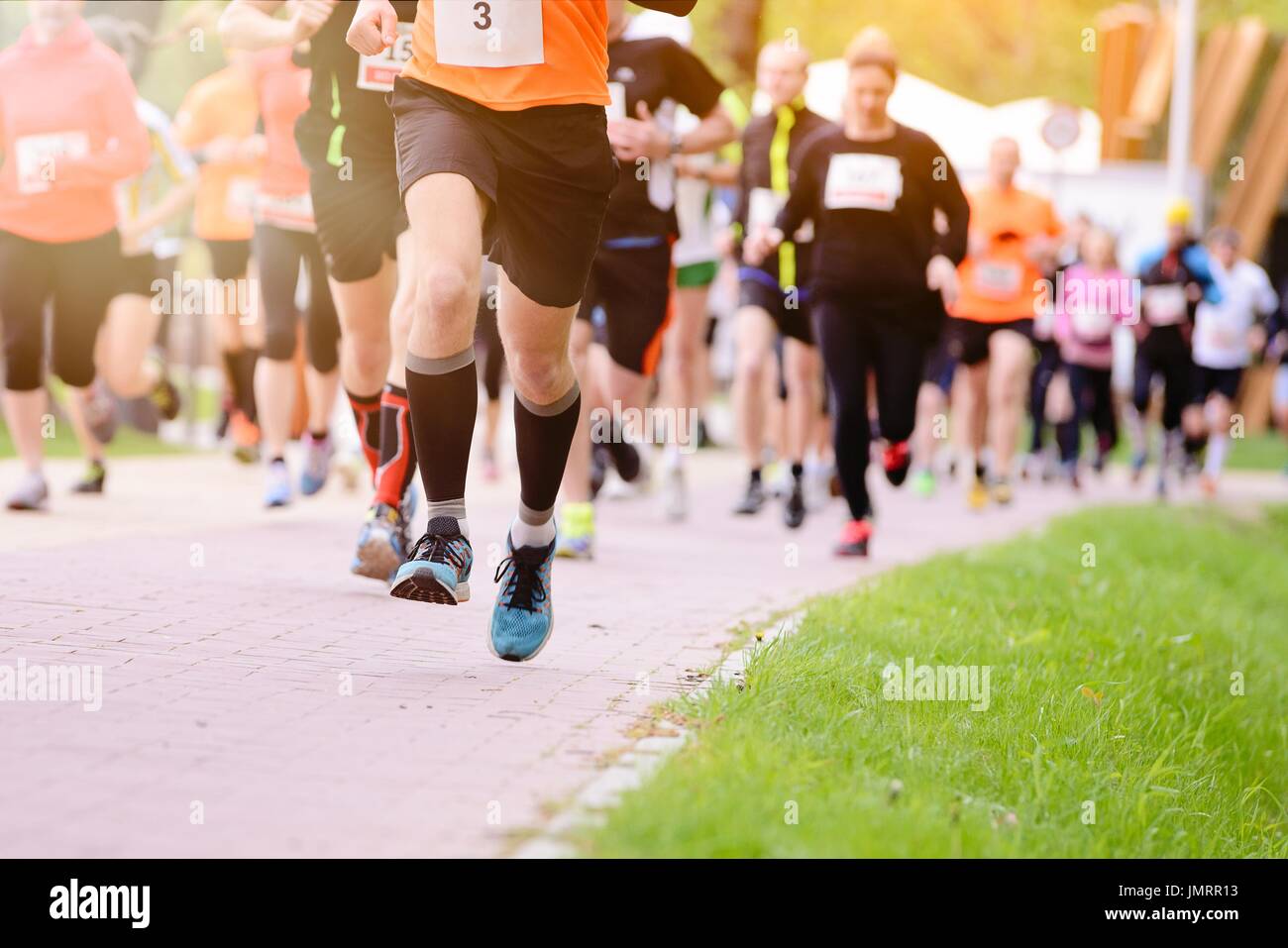 Summer running race in the park, people running Stock Photo - Alamy