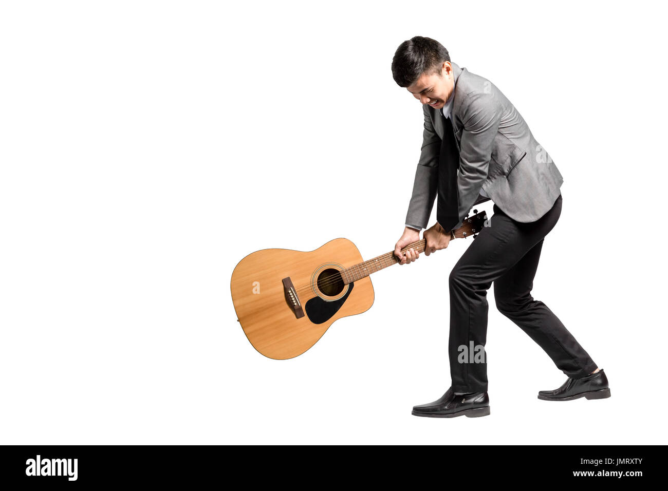Man smashing guitar Cut Out Stock Images & Pictures - Alamy