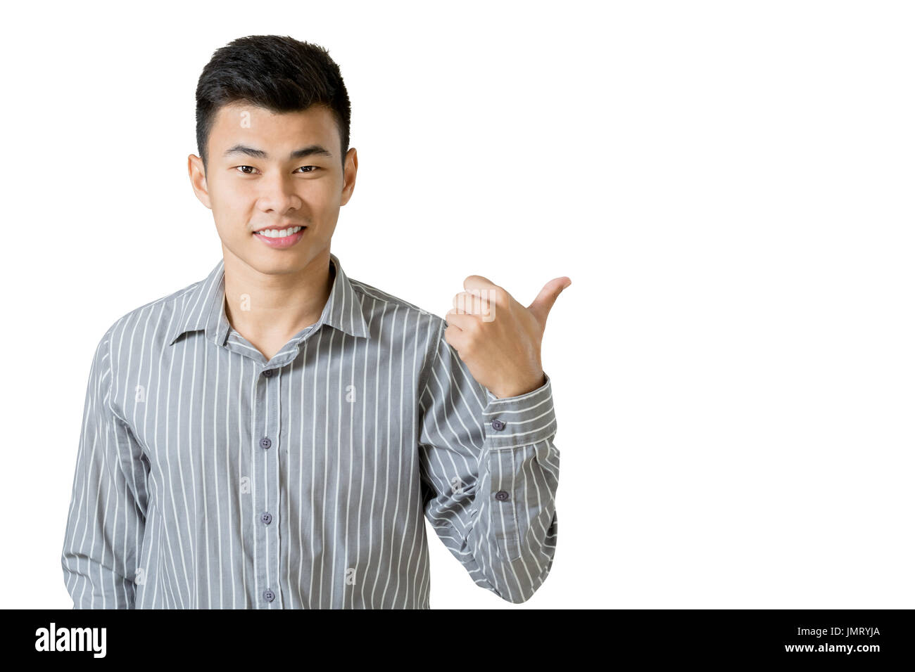 Young man pointing aside Cut Out Stock Images & Pictures - Alamy