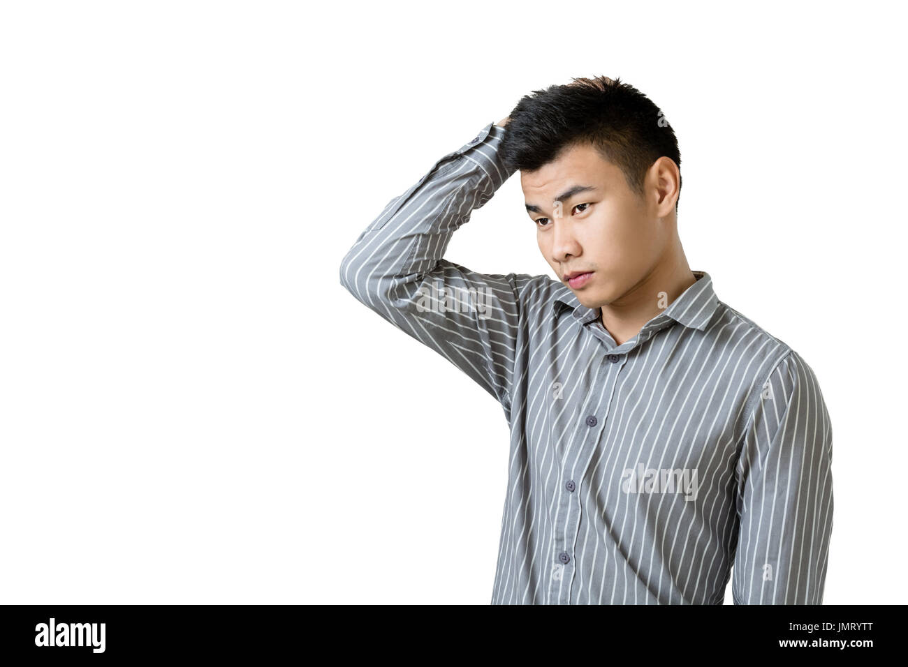 Portrait of a confused businessman scratching his head. Isolated on ...