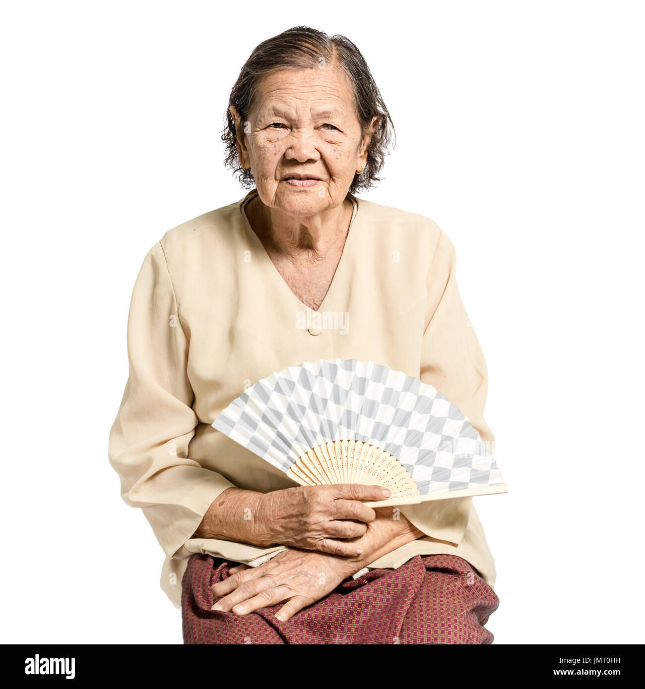 portrait of a mature woman with folding fan. Isolated on white ...