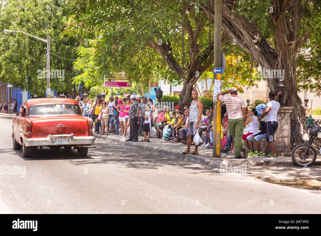 Bus stop queue, Cubans waiting for public transport in Matanzas, Cuba ...