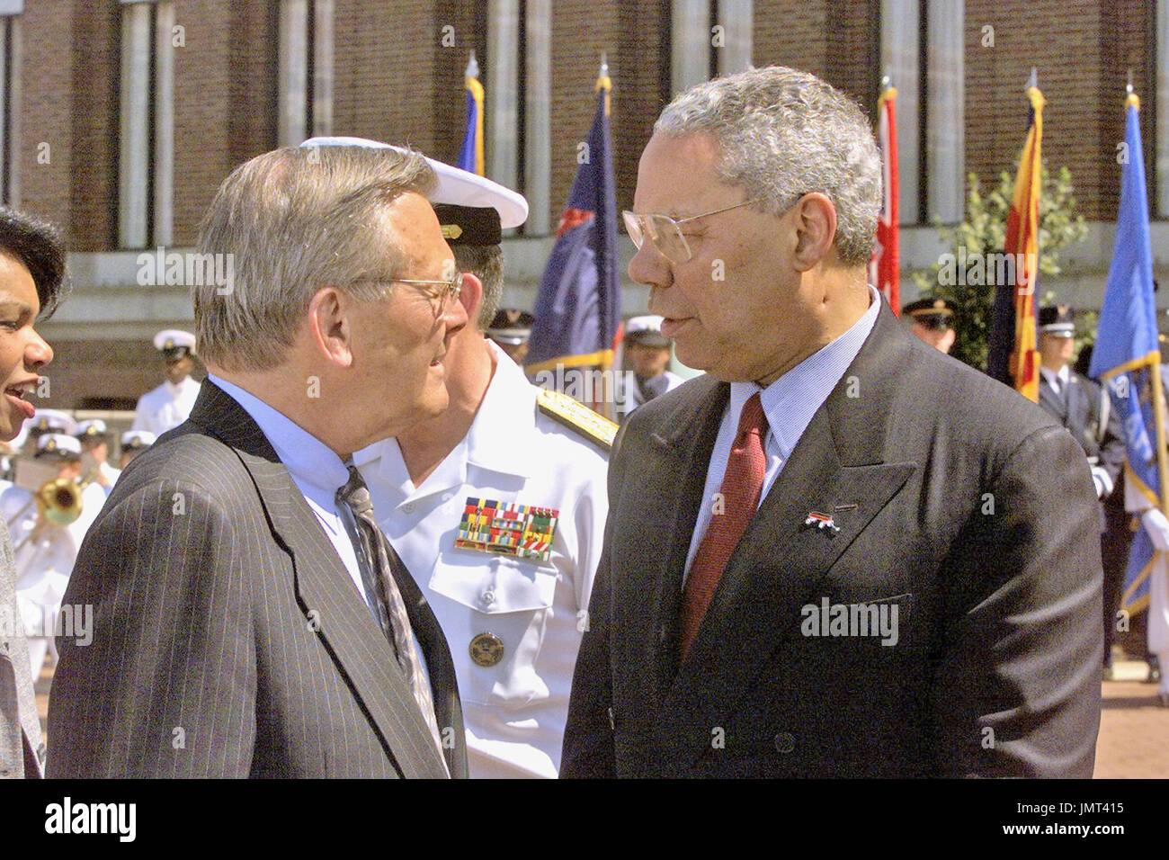 United States Secretary of Defense Donald Rumsfeld, left, shares some ...