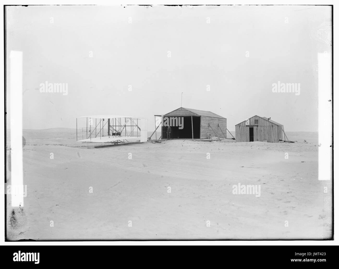 1903 machine and large camp building where it was housed, and smaller ...