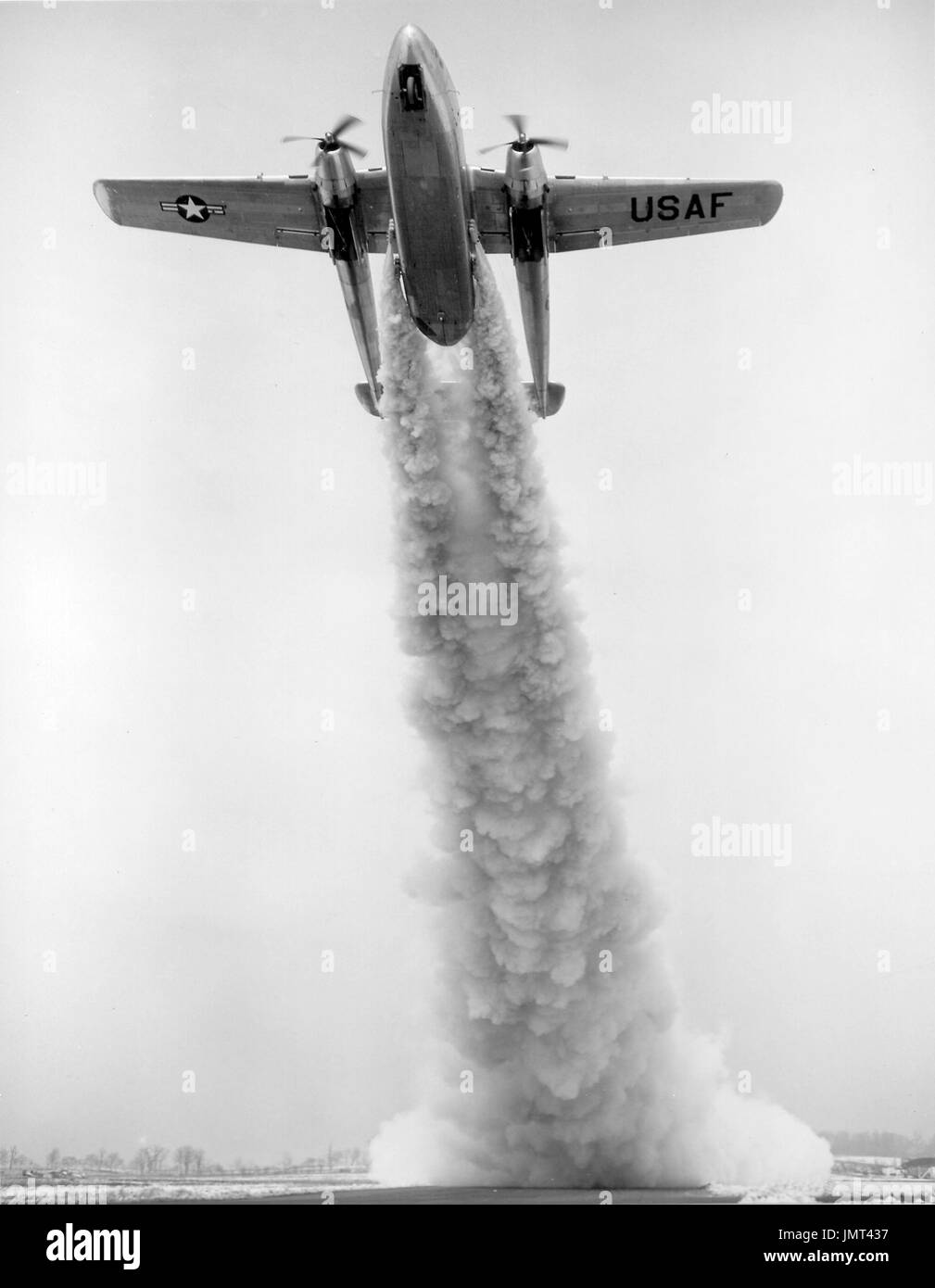 An AC-119K takes off using two J85 engines for jet-assisted takeoff ...