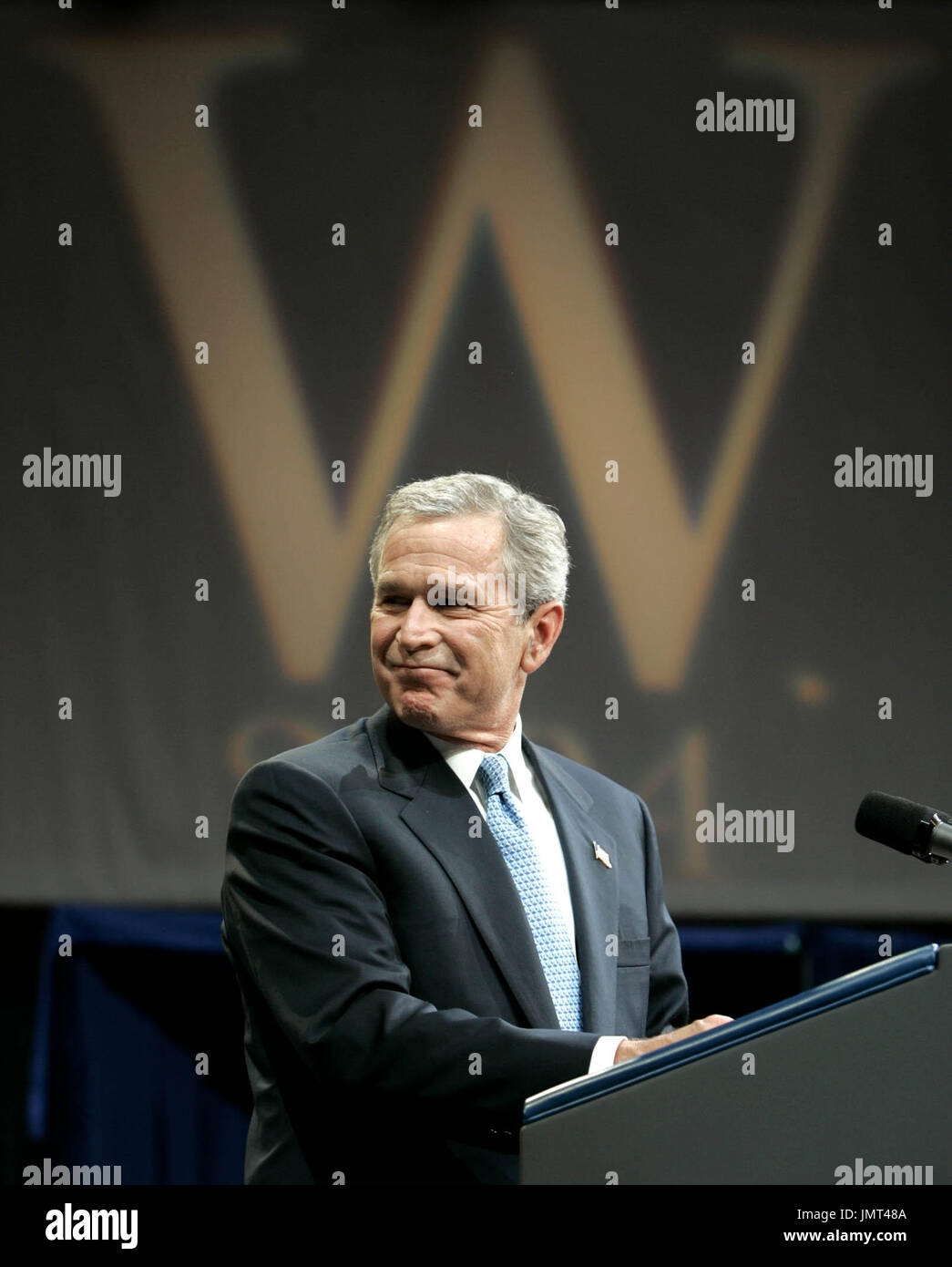 United States President George W. Bush smiles as he delivers his ...