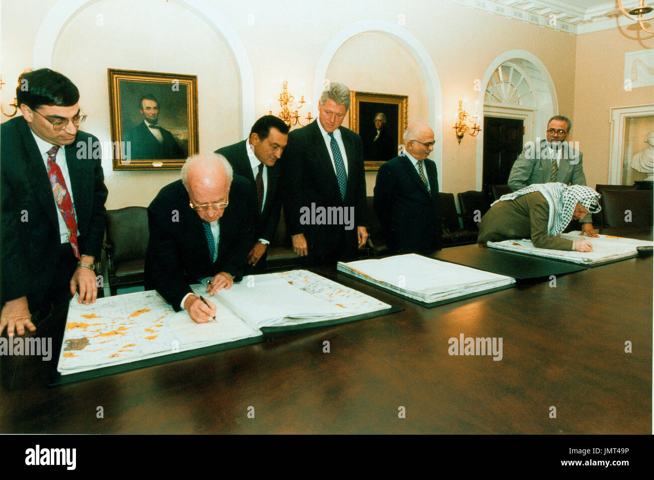 Israeli and Palestinian leaders sign the maps that were part of the ...