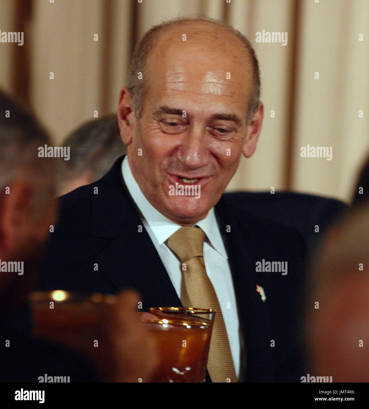 Israeli Prime Minister Ehud Olmert participates in a toast during a ...