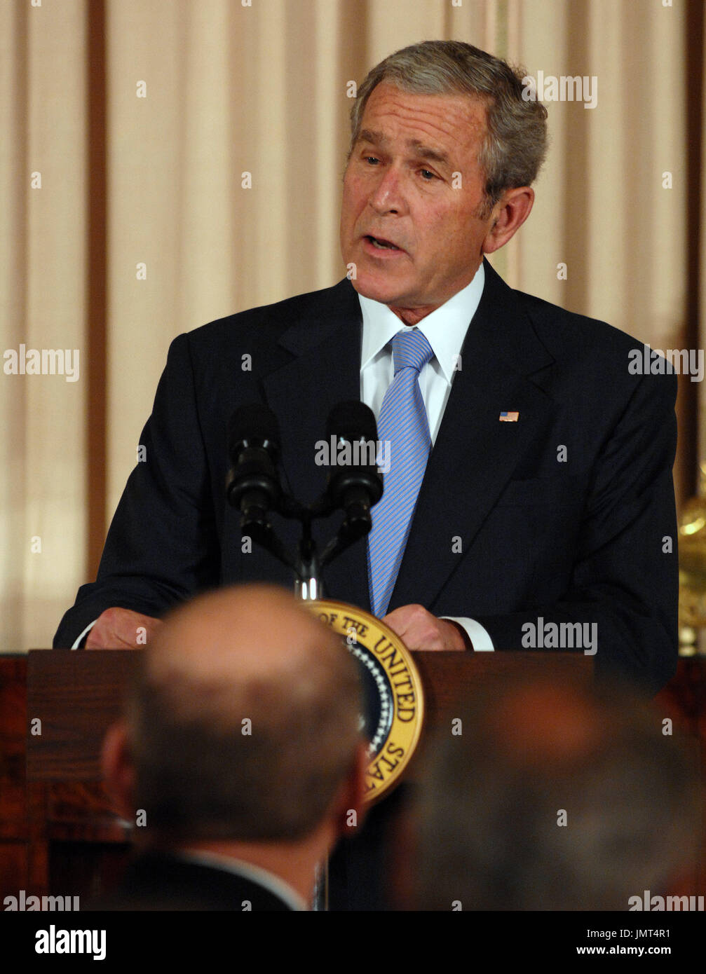 U.S. President George W. Bush speaks before he offers a toast during a ...