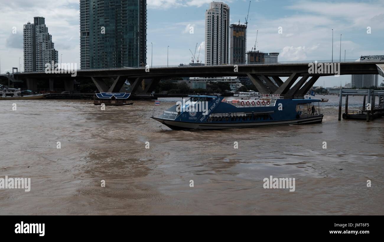 Shuttle to Asiatique Chao Phraya River below the Sathorn Taksin Bridge ...