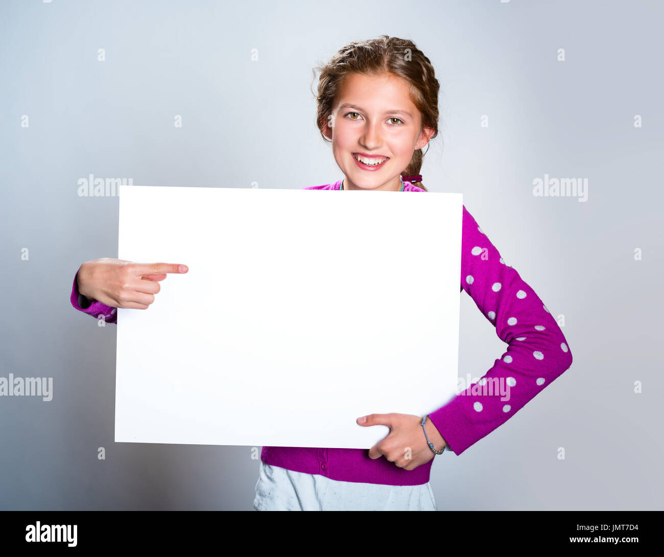 Happy girl with a promotional message Stock Photo - Alamy