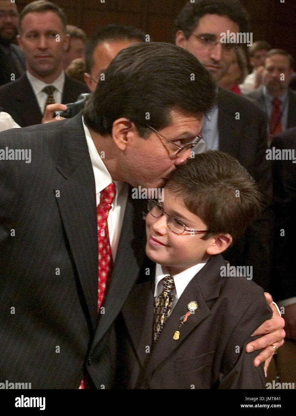 Judge Alberto R. Gonzales, Attorney General-designate is kisses his son ...
