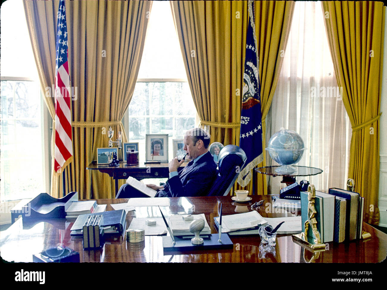 United States President Gerald R. Ford works in the Oval Office at the ...