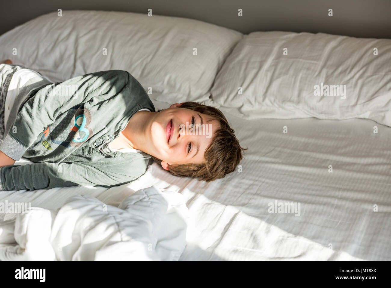 Child wakes up in the morning Stock Photo - Alamy