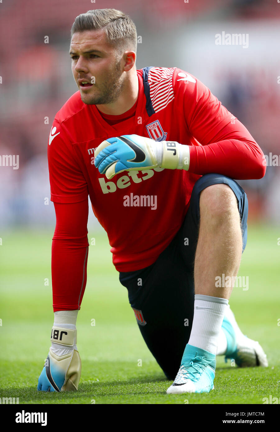 Stoke City goalkeeper Jack Butland warms up prior to match Stock Photo ...