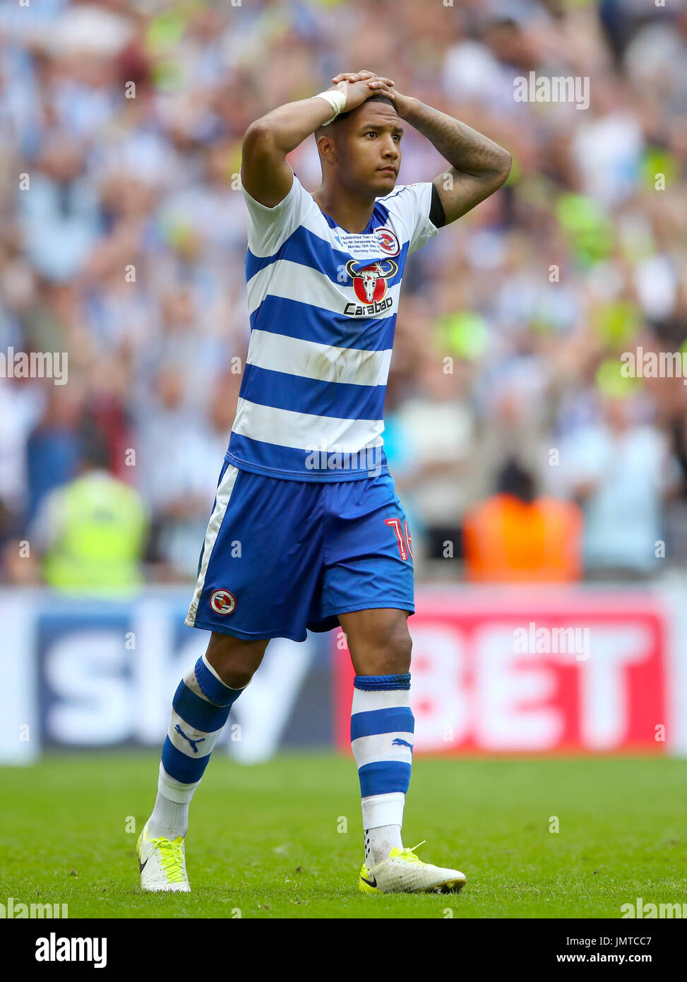 Reading's Liam Moore shows his dejection after missing his penalty in ...