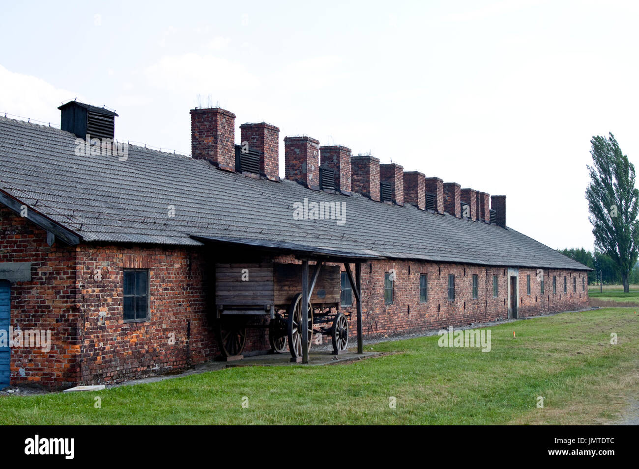 A building with many chimneys at the Auschwitz concentration camp Stock ...