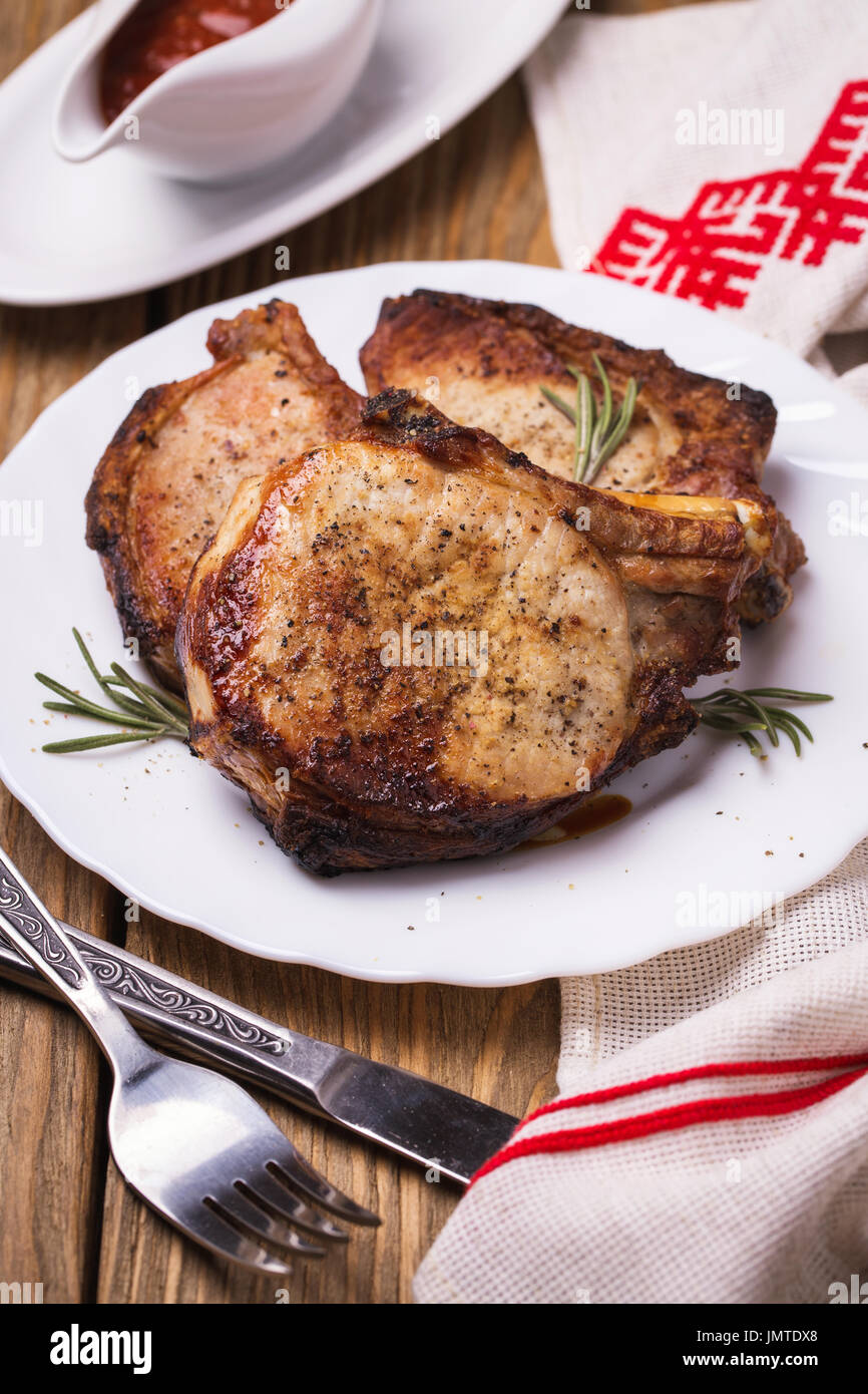 Baked pieces of pork Stock Photo - Alamy
