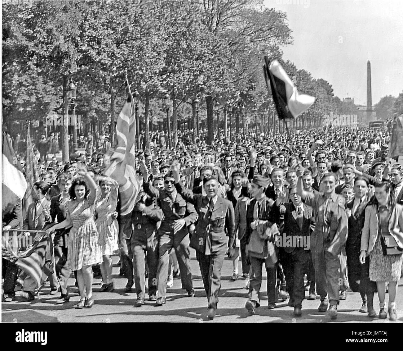 Paris, France - May 8, 1945 -- Joyous Parisians and Allied soldiers ...