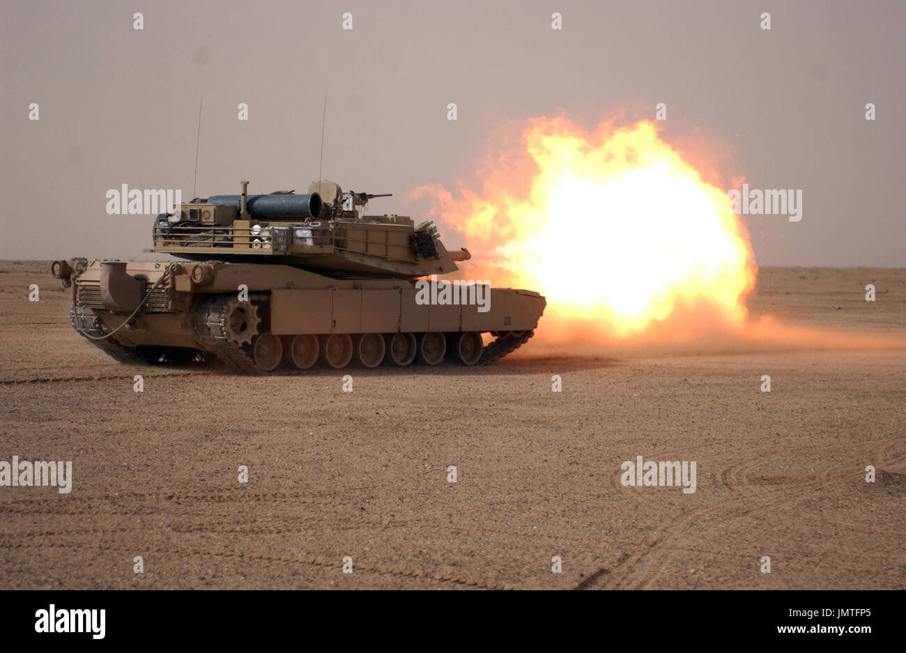 United States Marines fire the main gun of their M1A1 Abrams tank in ...