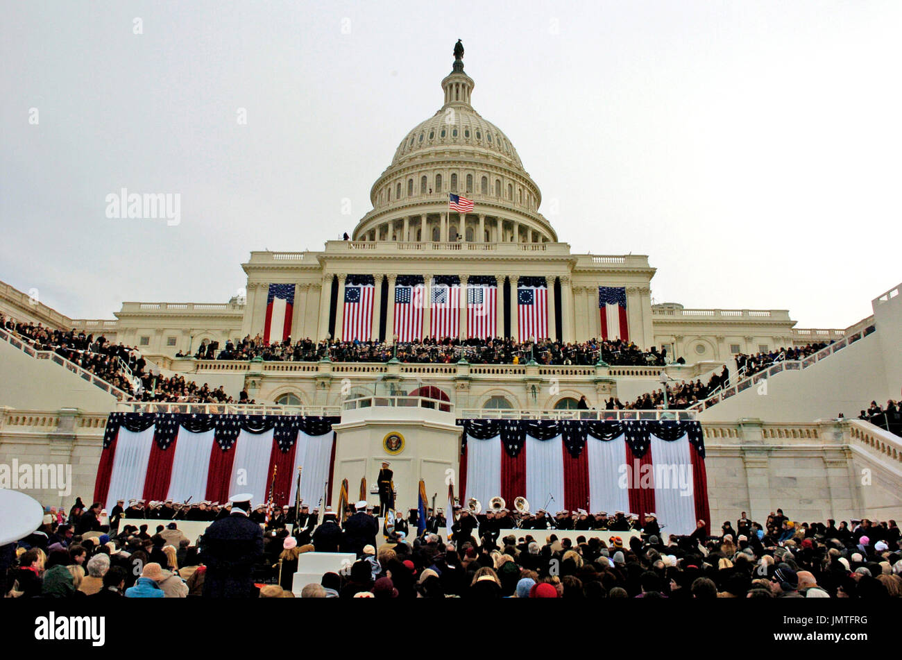 A crowd of thousands watch as United States President George W. Bush is ...
