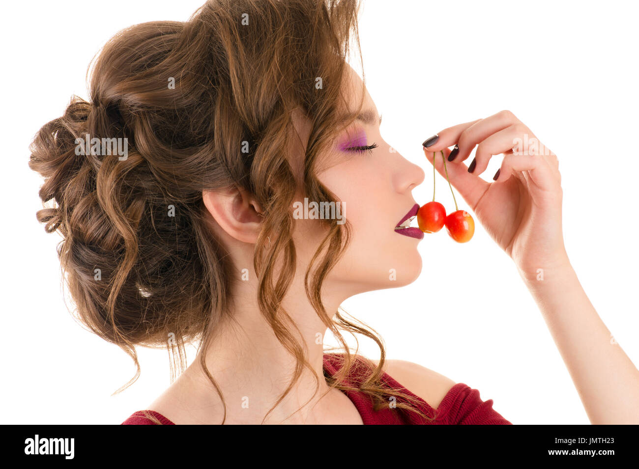 charming profile face girl with beautiful hairstyle and cherry Stock ...