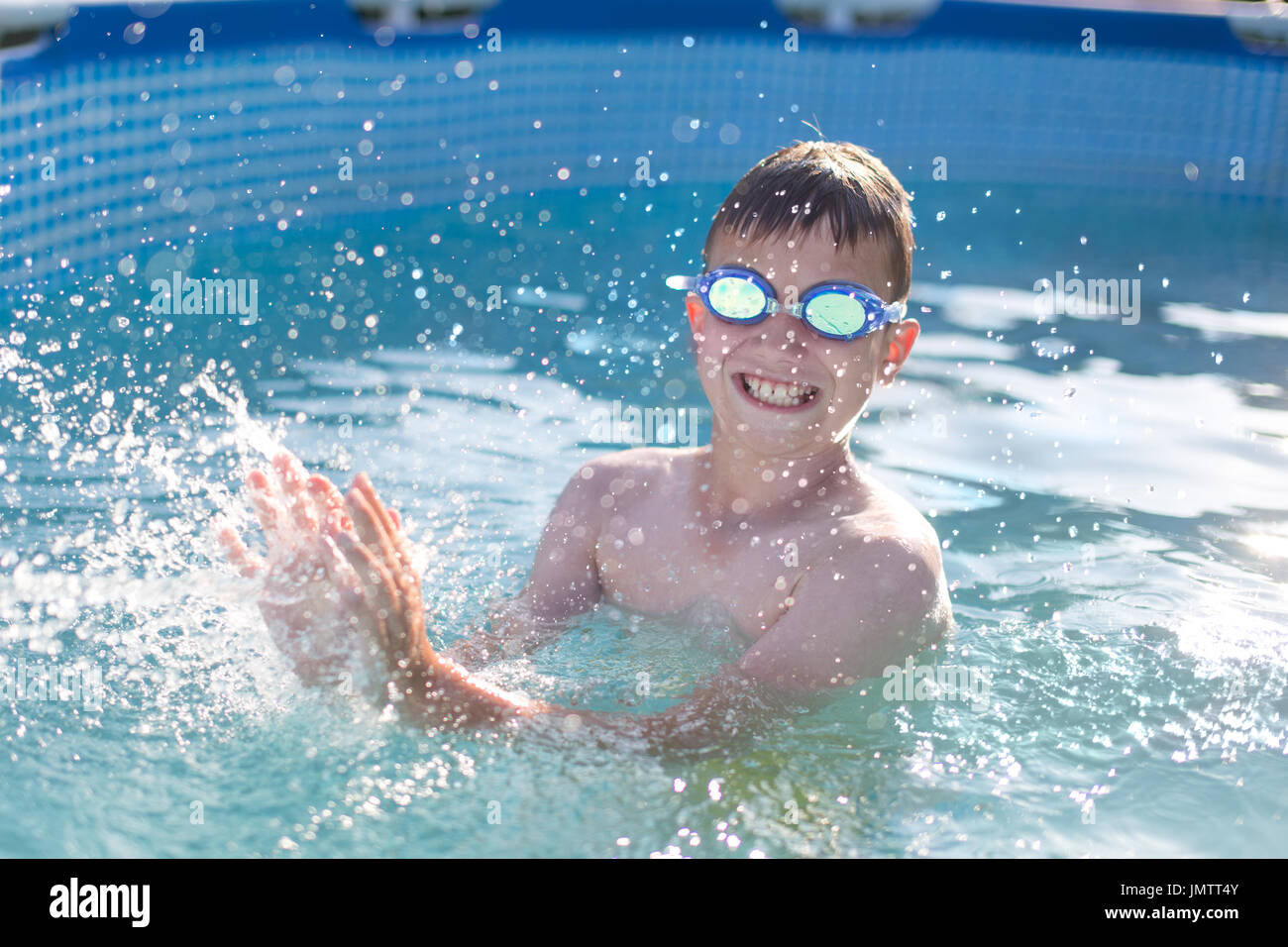 Child boy splash splashing water hi-res stock photography and images ...