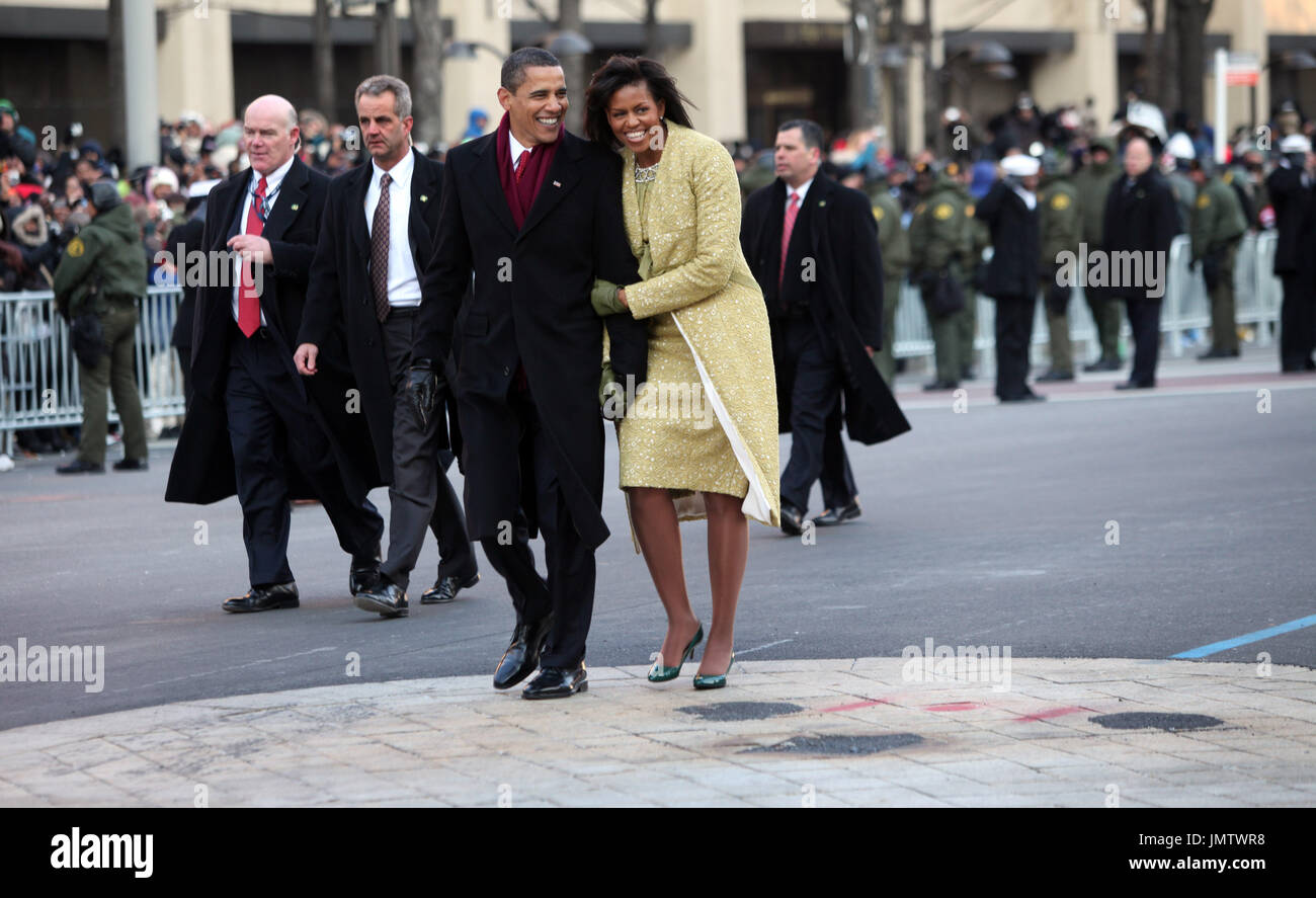 President Barack Obama and First Lady Michelle Obama walk down ...