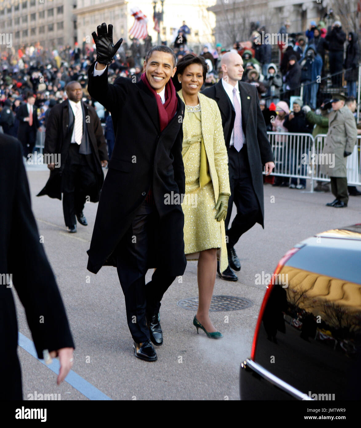 President Barack Obama and First Lady Michelle Obama walk down ...
