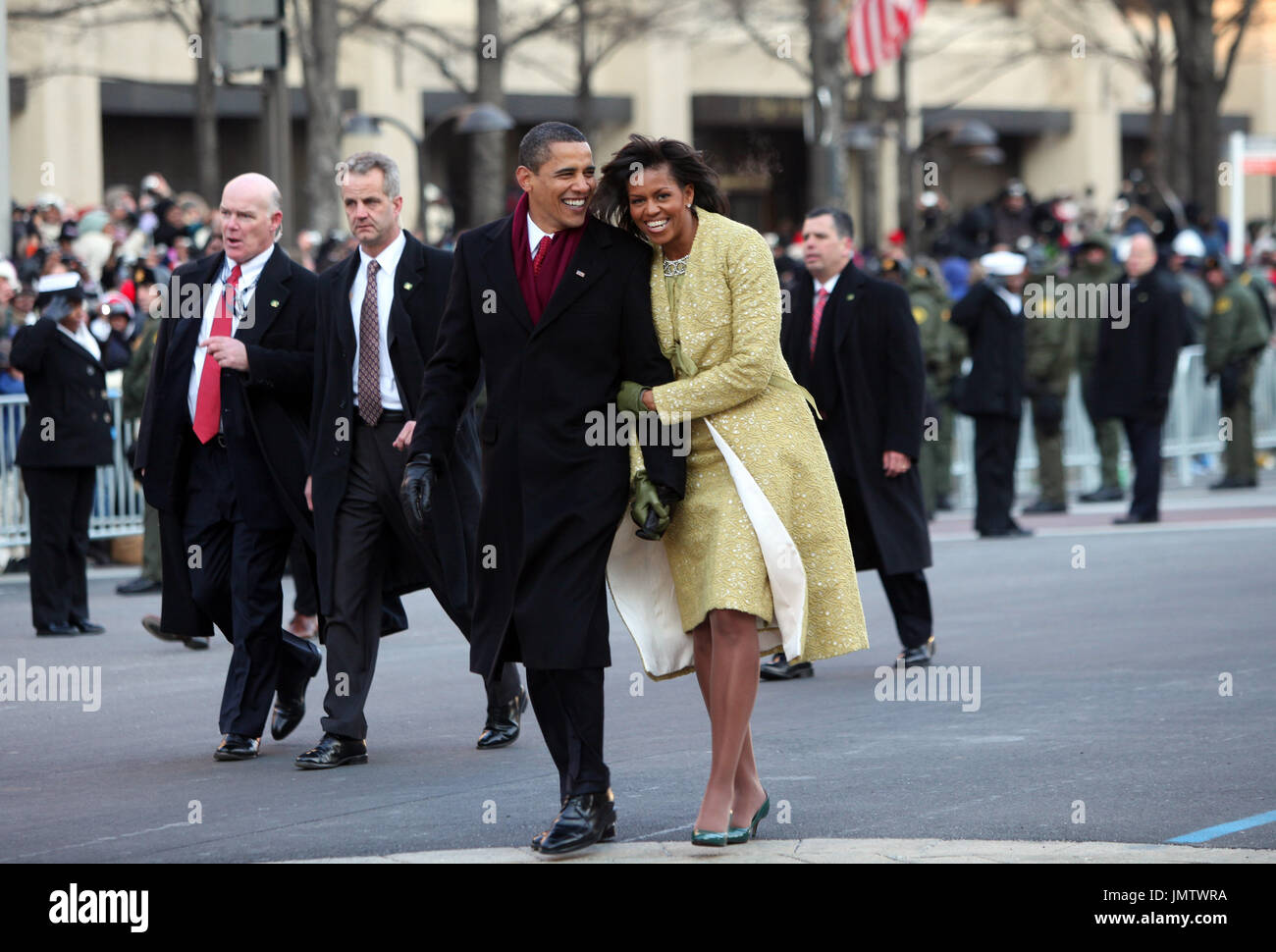 President Barack Obama and First Lady Michelle Obama walk down ...