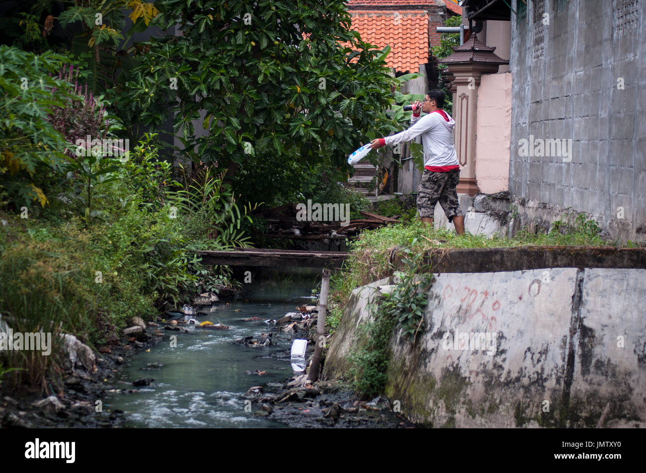 Kid throwing trash hi-res stock photography and images - Alamy