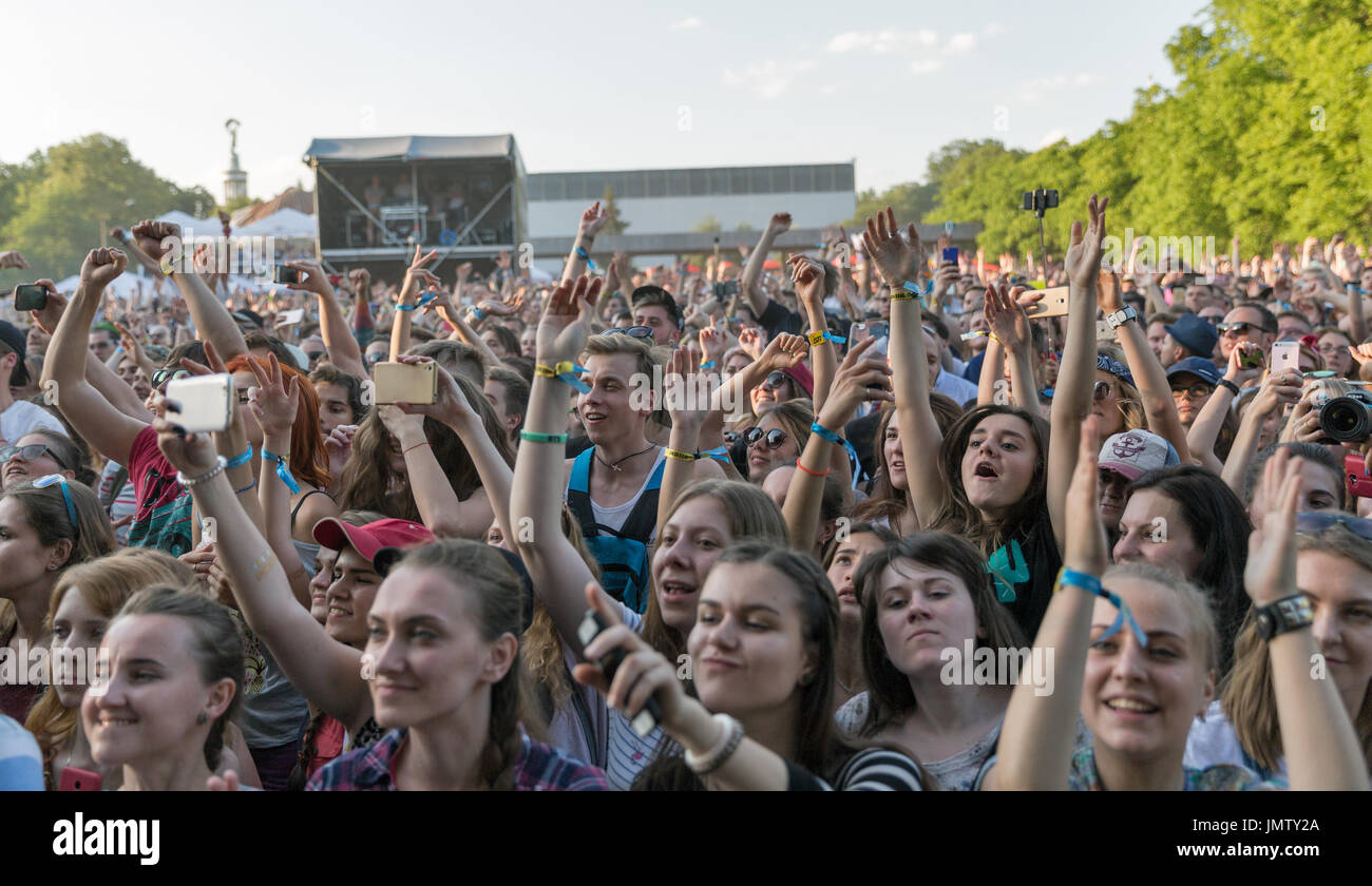 KIEV UKRAINE JUNE 29 2017 Young fans enjoy music concert outdoors at the Atlas Weekend music festival in National Expocenter Stock Photo Alamy