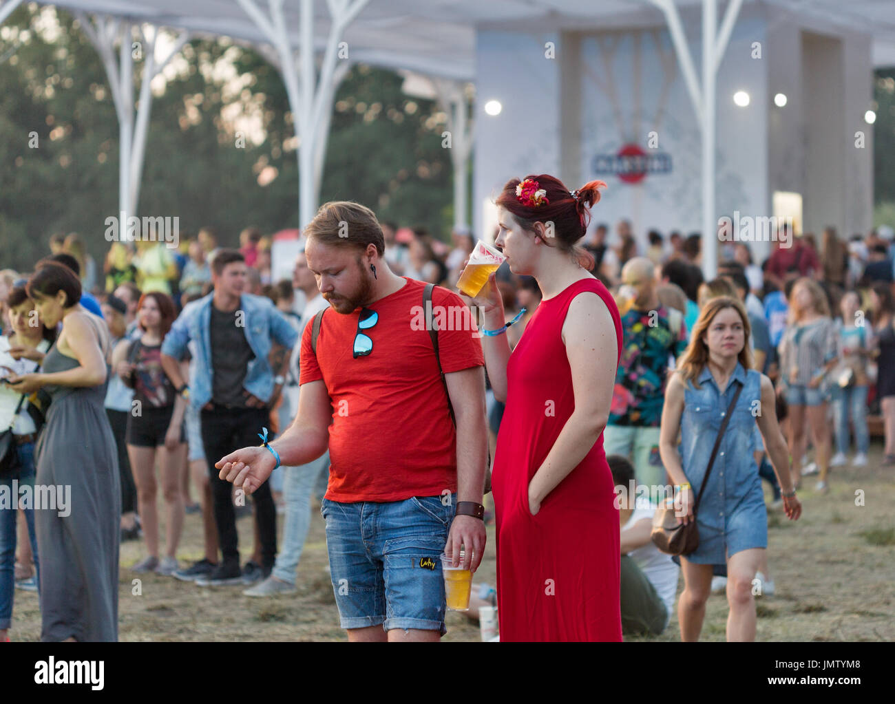 KIEV, UKRAINE - JUNE 29, 2017: Fans visit music concert outdoors at the ...
